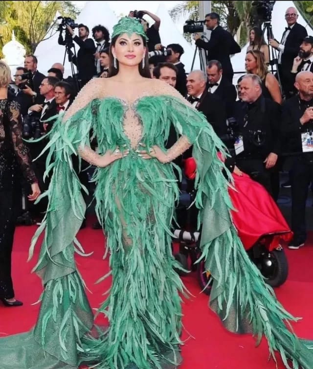 Urvashi Rautela wore a green-feather detailing dress at Can