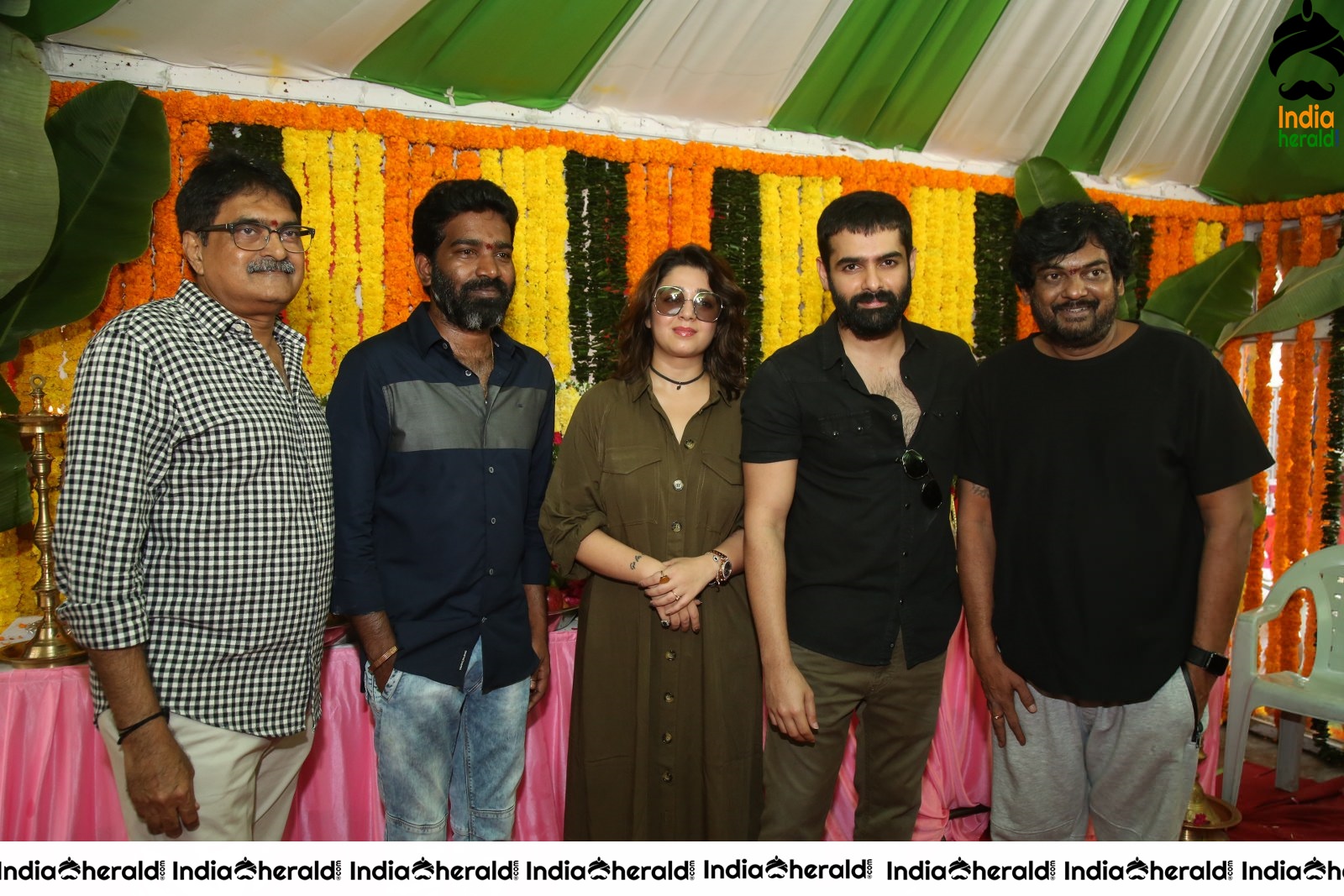 Actor Ram Pothineni stills with Charmi and Puri Jagannath S