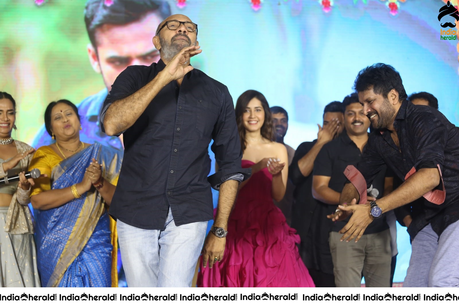 Actors of all ages from Prati Roju Pandage Team Dance On th