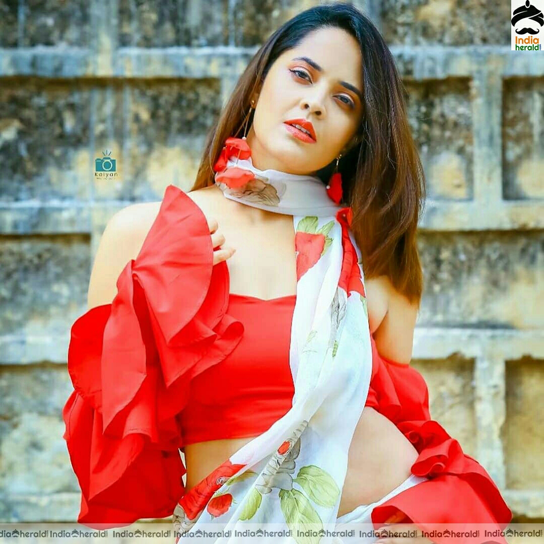 Anasuya Latest Cute White And Red Saree Stills