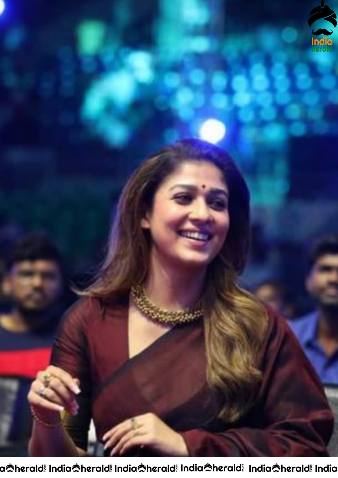 Cute Nayanthara Expressions in Brown Saree