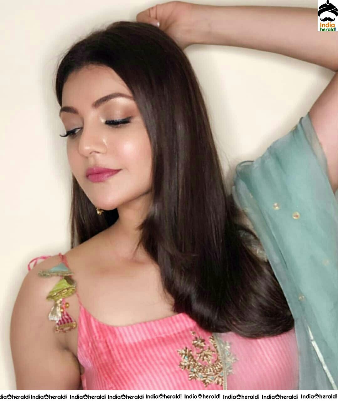 Kajal Aggarwal Hot Stills In Sleeveless Pink Chudi