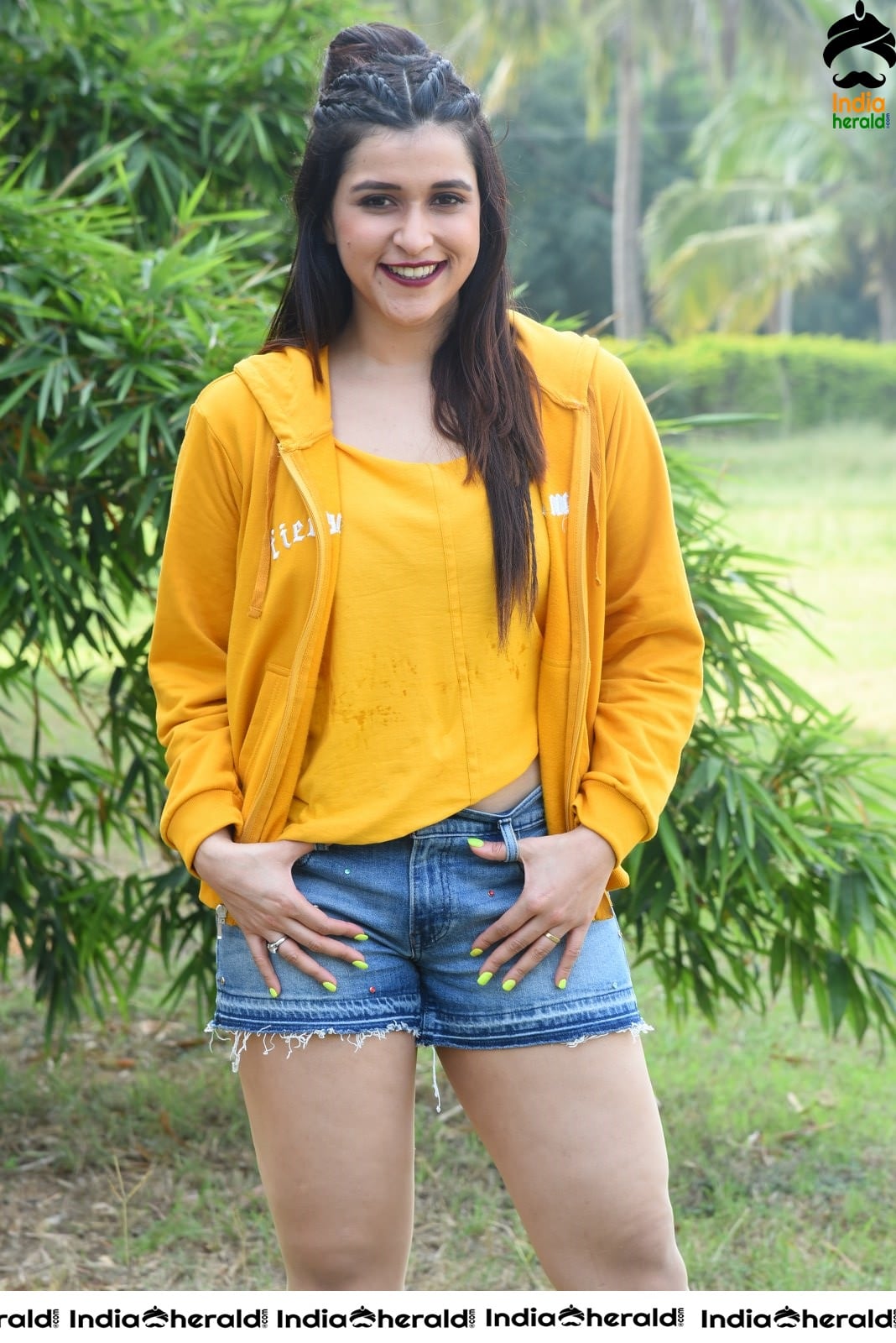 Mannara Chopra Hot Thighs Show in Sexy Shorts and Yellow Je