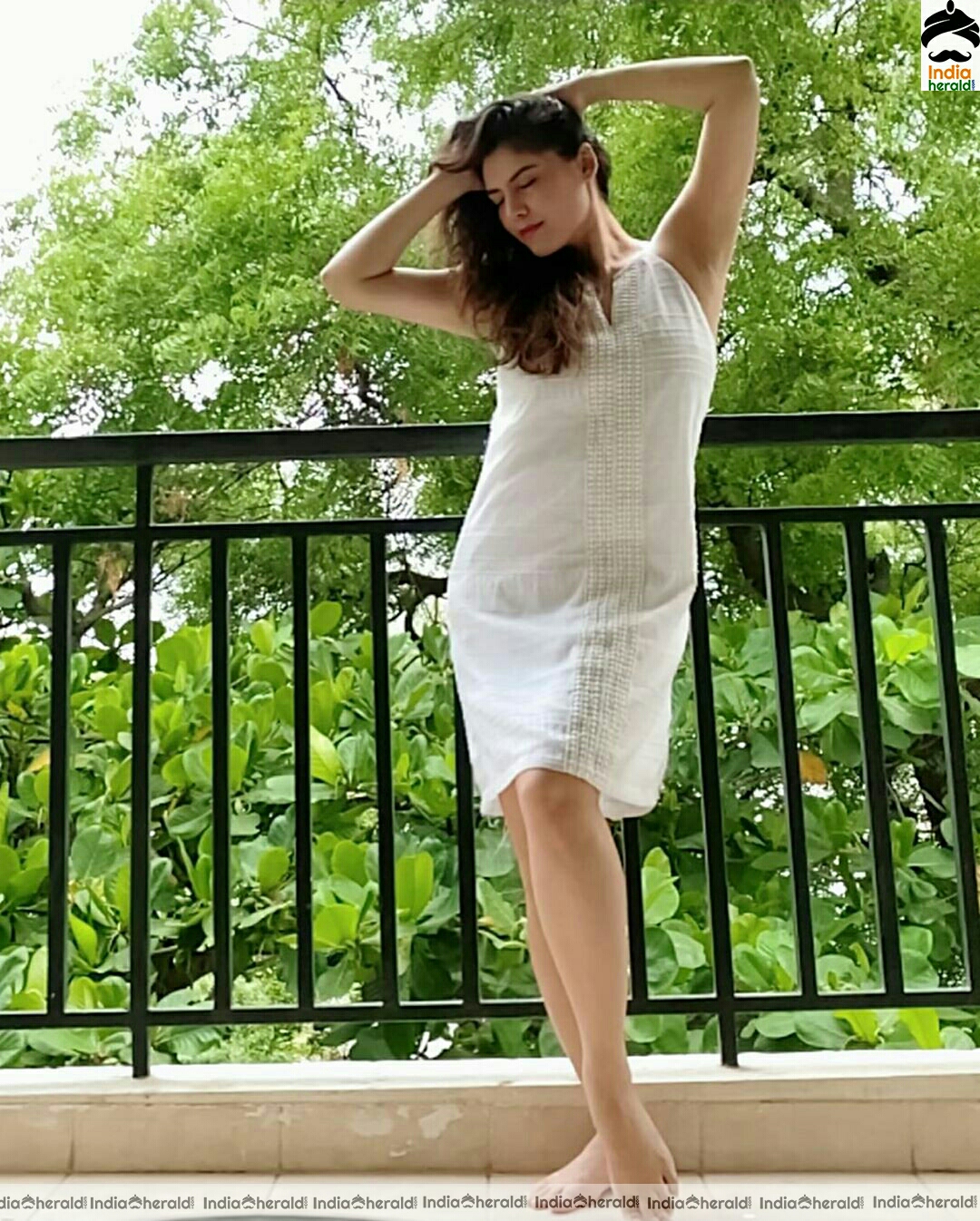 Sherin Cute Latest White Short Frock Stills