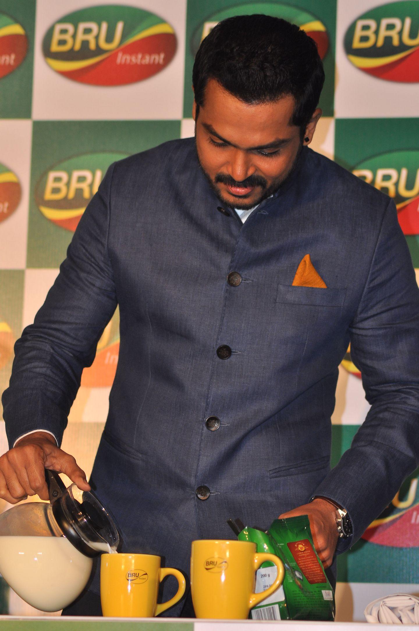 Actor Karthi and kajal Launch in bru Photos