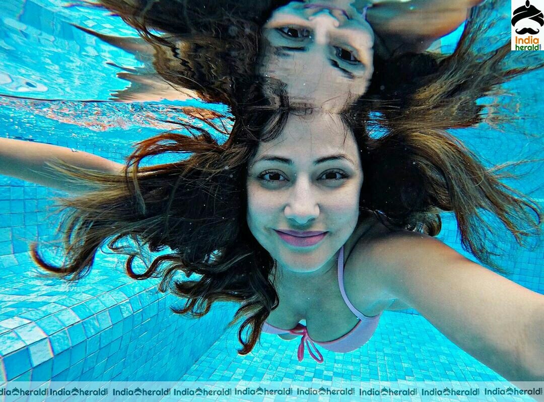 Hina khan Hot bikini Stills in pool