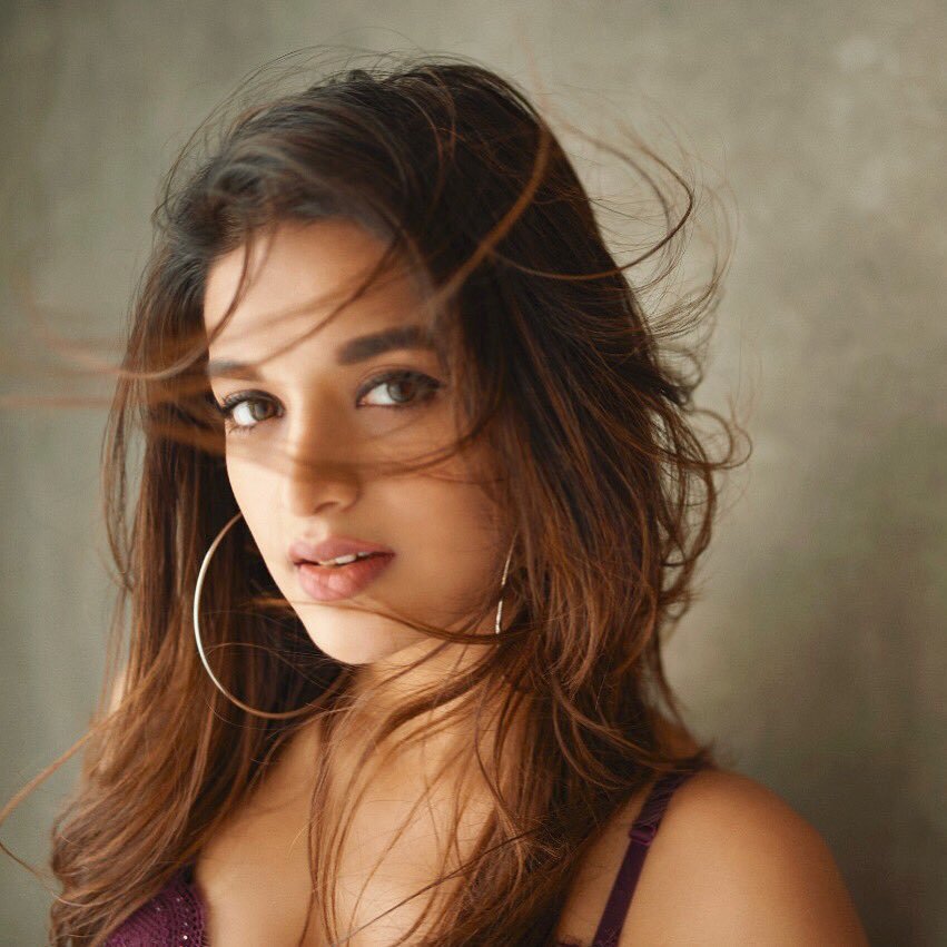 Nidhhi Agerwal Hot Cleavage And Hip Show Photos Collection