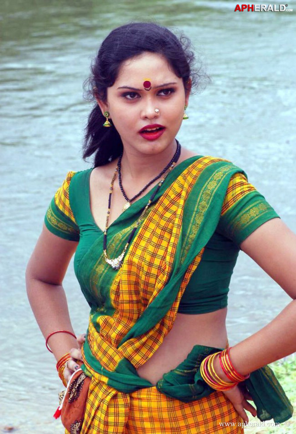 Asmitha in Green Saree Spicy Pics