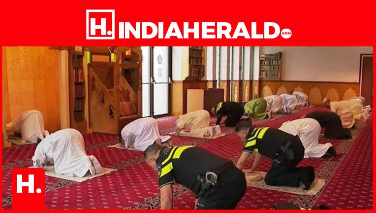 European police officers pray in mosques in uniform - What