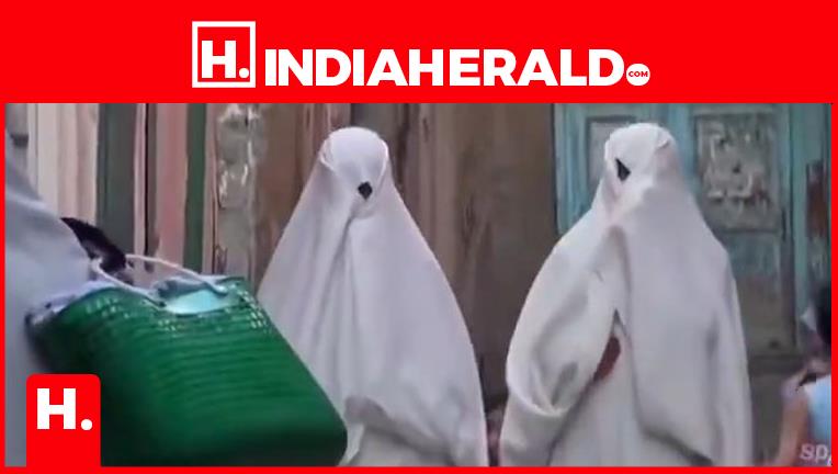 In Algeria Women Are Completely Veiled and Allowed To See T