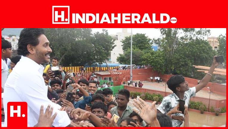 What The.... Jagan Smiling at Rain Affected Victims
