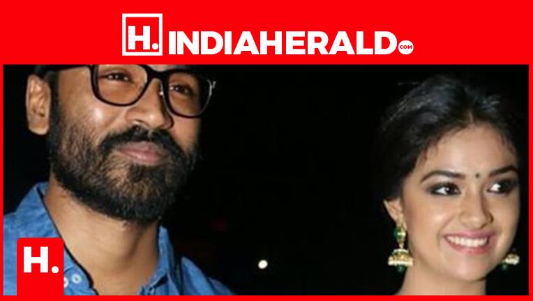 Keerthy Suresh and Dhanush in Thodari Throwback Event Photo