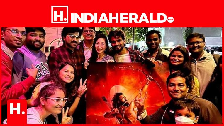 RRR in Japan - Ram Charan poses with Fans