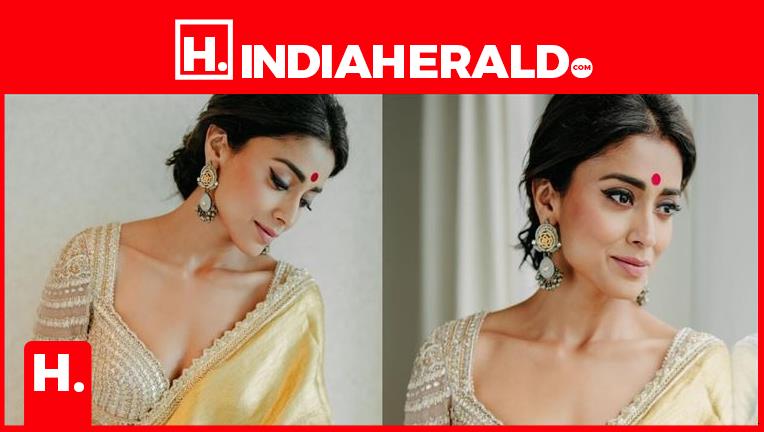 Shriya Saran Crafts Traditional Glam In South Gold Silk Sar