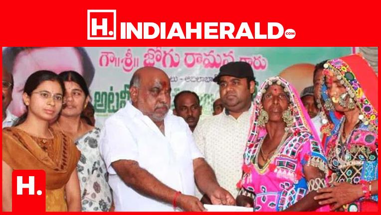 MLA Jogu Ramanna hands over podu land pattas to 4,017 triba