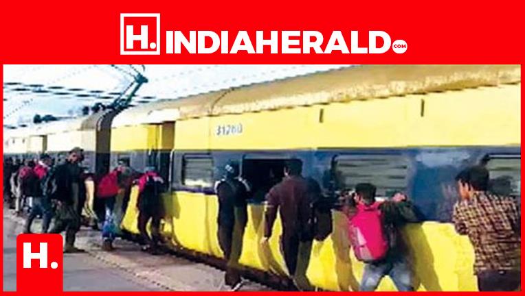 Passengers pushing Train Carriages?