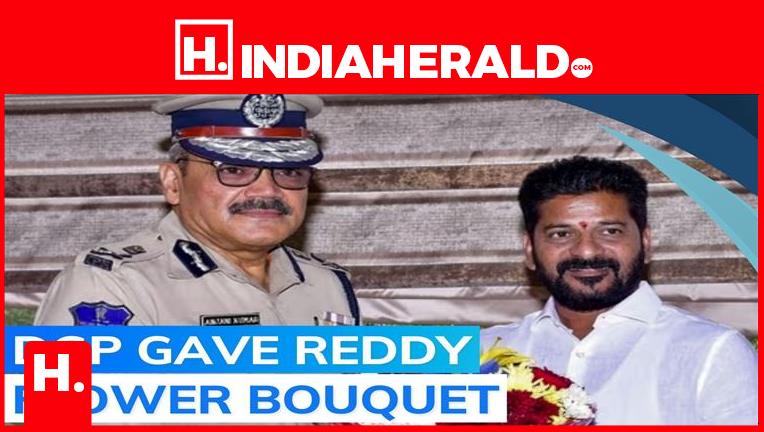 The officer who congratulated Revanth Reddy is suspended?