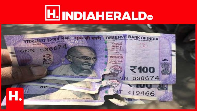 What to do if torn currency notes come out of ATM..