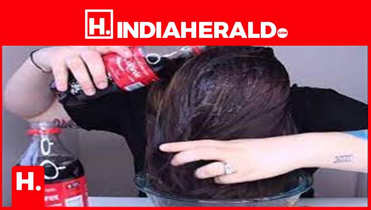 The celebrity who pours Coca-cola on her head and rubs it..